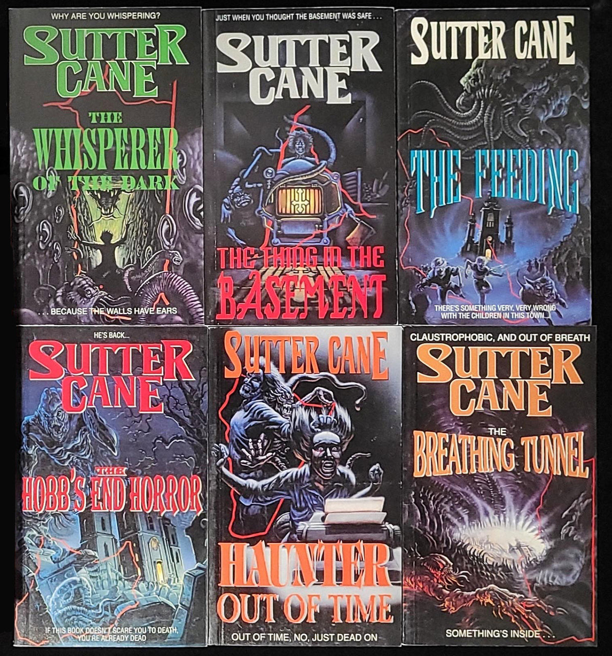 In The Mouth Of Madness Sutter Cane Movie Prop Books Storm King